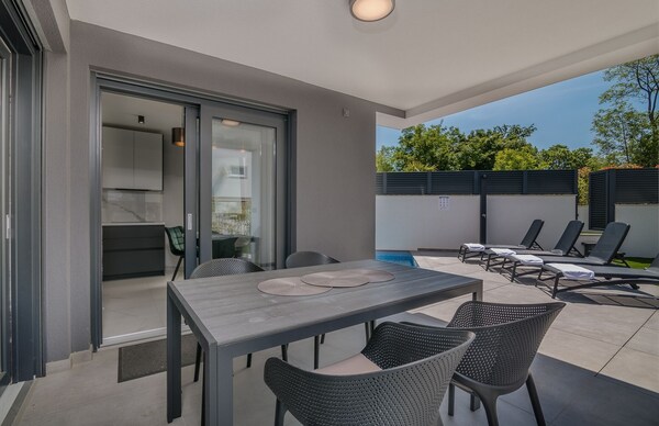 Two Bedroom Apartment With Terrace Njivice, Krk (A-22806-a) - Cres Island, Croatia