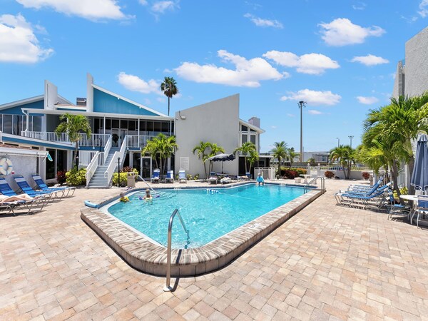 Stylish Canal-front Condo- Balcony, Pool, Dock + Hot Tub Access - Madeira Beach, FL