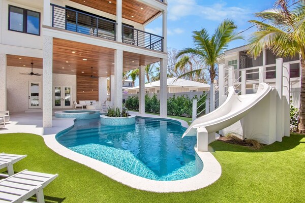 Between The Waves: Large Siesta Key Rental With Pool, Waterslide, & Rooftop Deck - Sarasota, FL