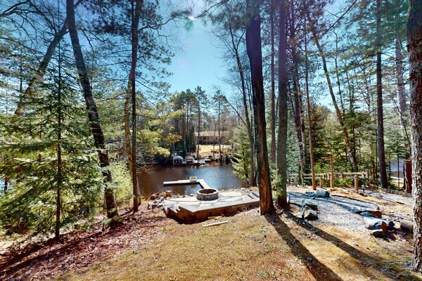 Charming Northwoods Riverfront Home, W/ Chain Access, Fire Pit, Gas Grill & Wifi - Eagle River, WI