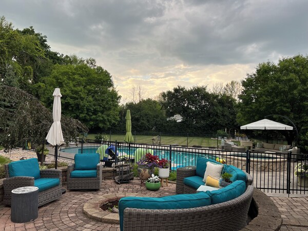 "Luxurious 4-bedroom Home With Gourmet Kitchen, Pool, And Theater Room\nnear Eaa - Oshkosh, WI
