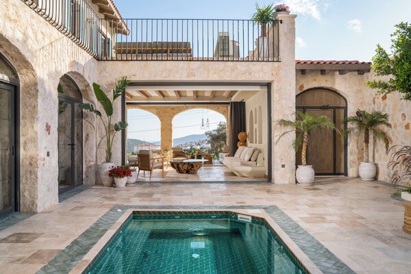 Thalia, A Joyful Serenity Unmasked - Kalkan