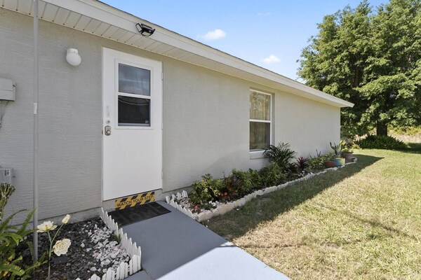 Tropical Azalea Oasis | Palm Coast 2br Guest Wing W/ Pool | Partial Home Rental - Palm Coast, FL