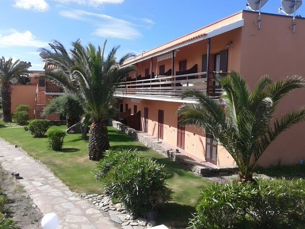 Studio 'Sergi - Piscina In Comune' With Sea View, Shared Pool And Private Terrace - Stintino