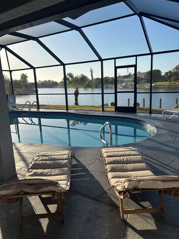 Canal-front Home, Heated Pool,  75 Tv , Bikes - North Fort Myers, FL
