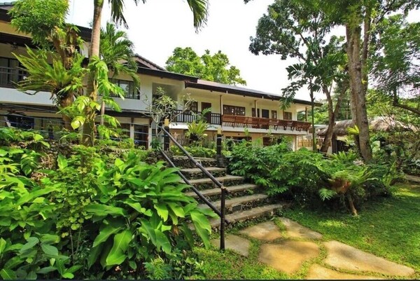 Nestled Amidst Lush Gardens And Sprawling Green Landscapes Of The Strand Boracay - Malay