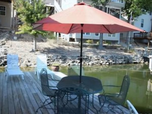 Lake Of The Ozarks Lake Front Home With Boat Slip And Swim Platform Dock - Lake Ozark, MO