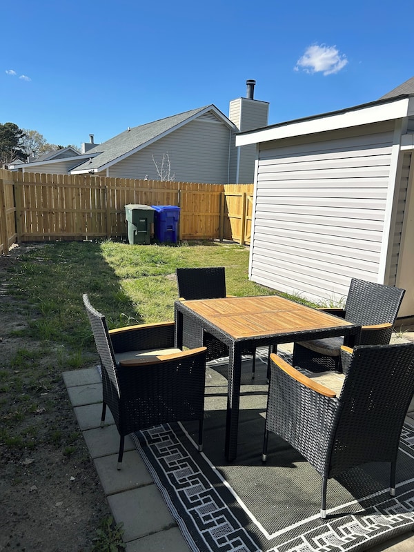 \Nmodern 2br W/ Huge Gated Yard, Smart Tvs + Patio Vibes! - Greenville, NC