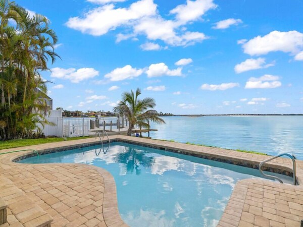 Stunning Riverfront Home With Dock, Pool + Game Room - Cape Coral, FL